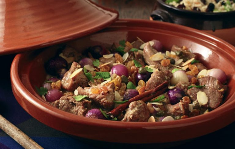 Moroccan spiced turkey tagine with raisins, ginger, and almonds recipe ...