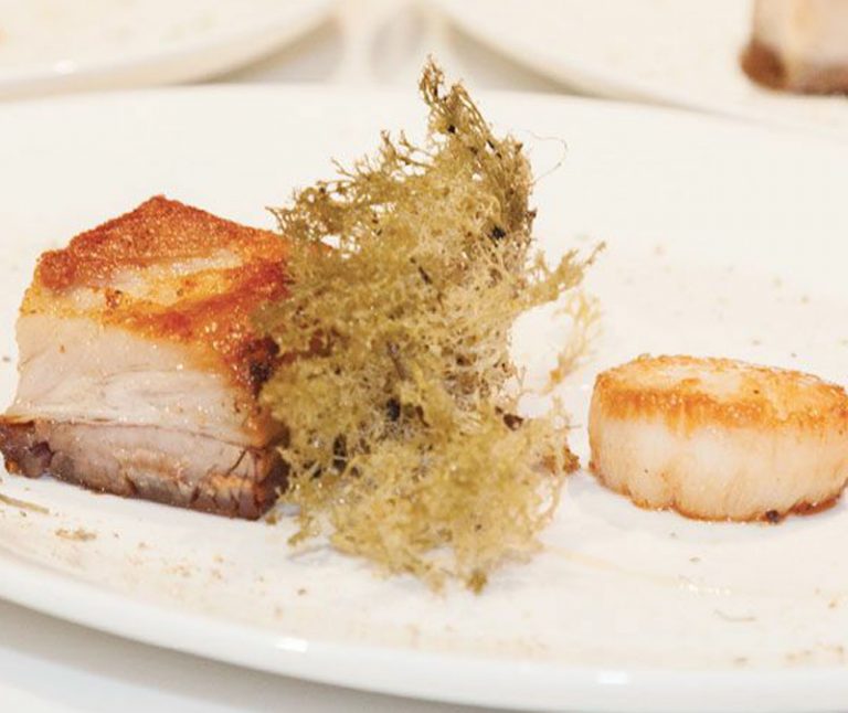 Pork belly, scallops, and reimdeer lichen, with an elderberry gastrique ...